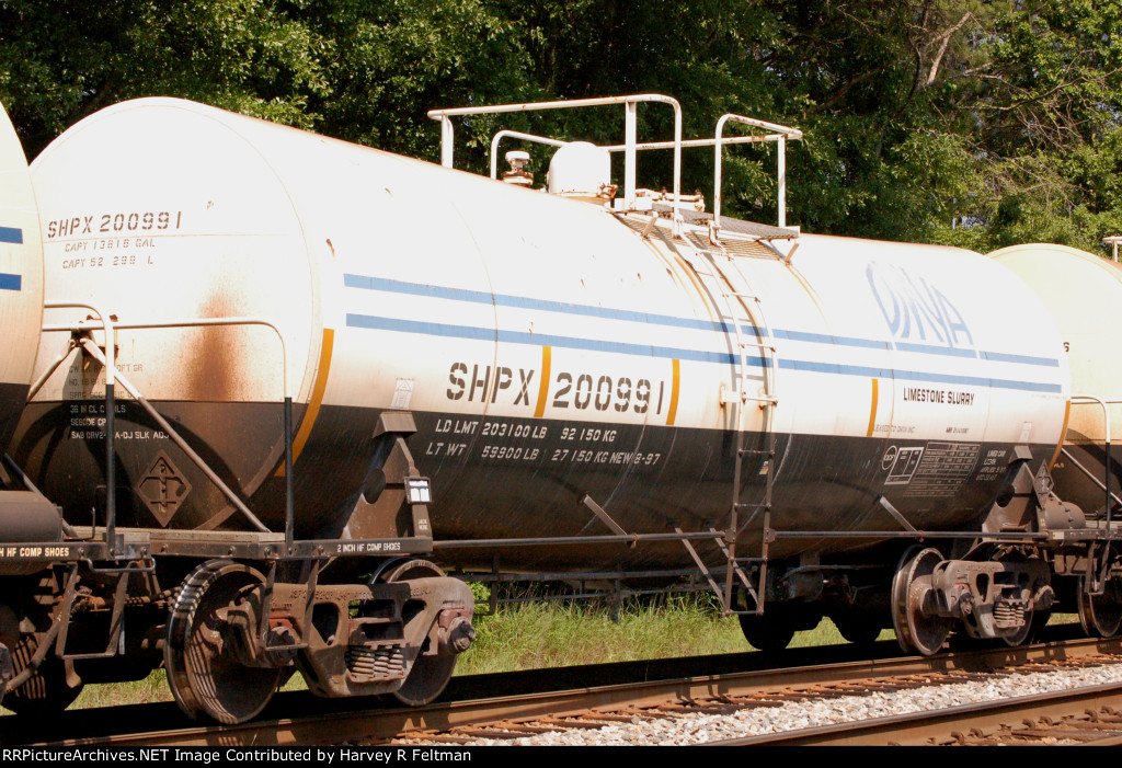 SHPX tank car #200991, built August 1997 by American Car & Foundry and leased to OMYA for ...